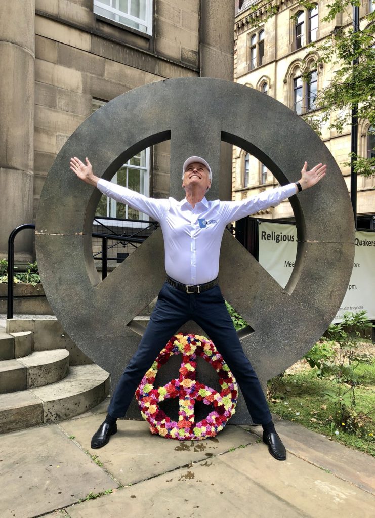 Bernard Weber in Manchester with Flower Power and Peace | About New7Wonders